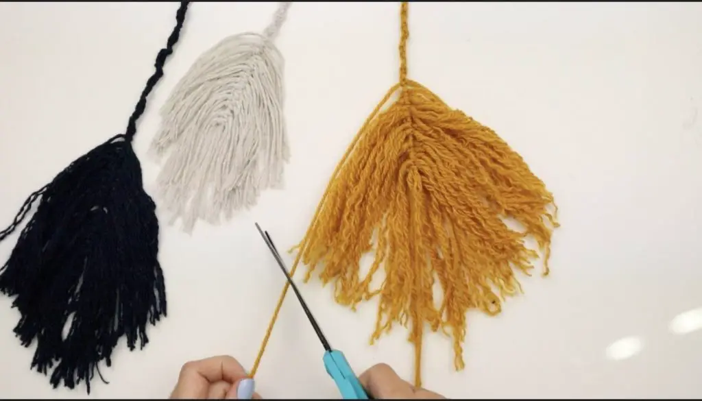 How to Make a DIY Macrame Leaf Wall Hanging - Andrea Peacock